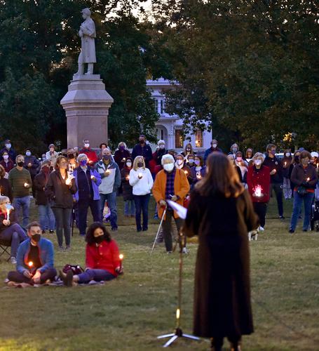 ‘Something about this togetherness’: Vigil for RBG draws 300