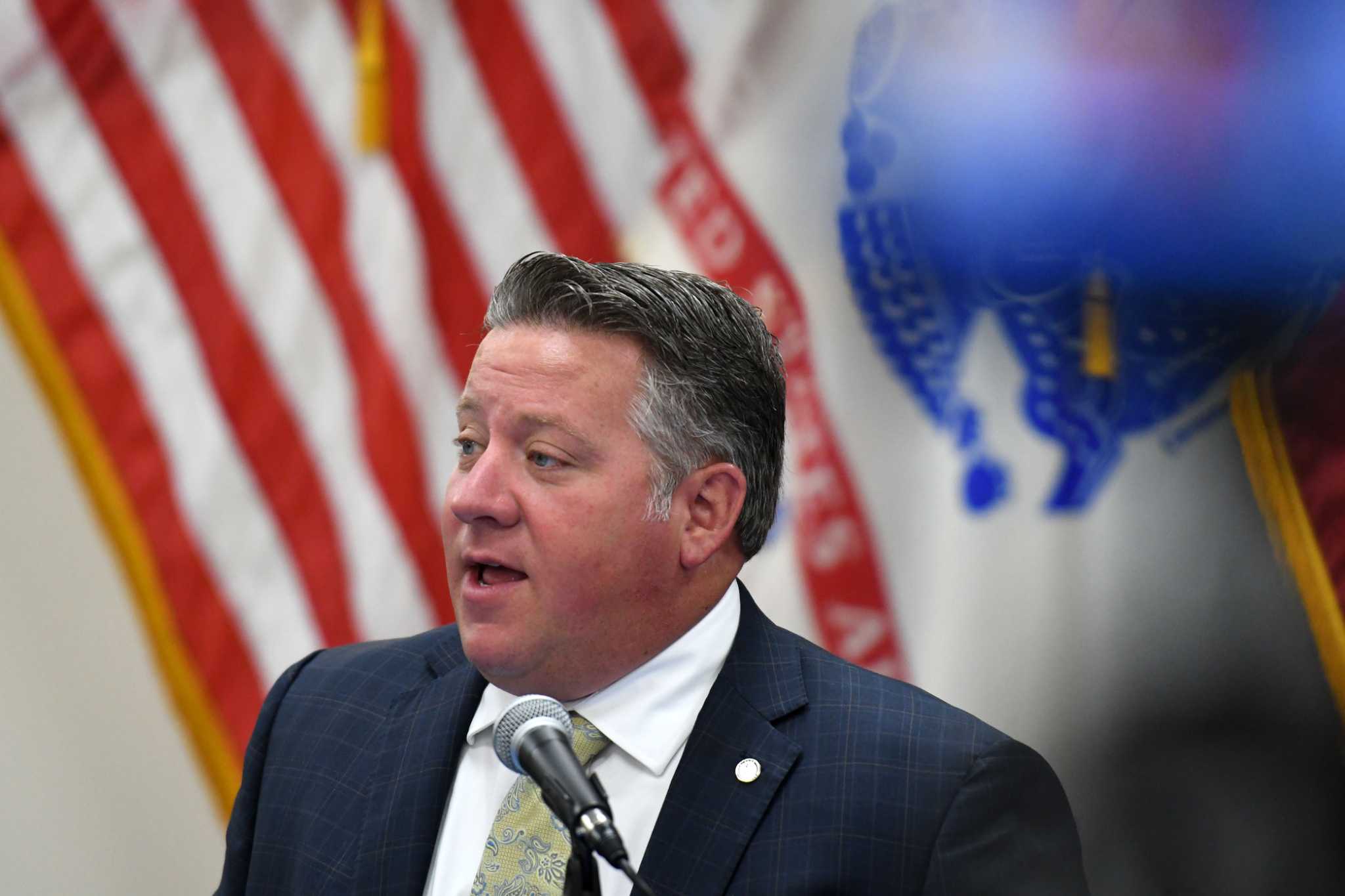 McCoy presented with $700K check as result of county partnership
