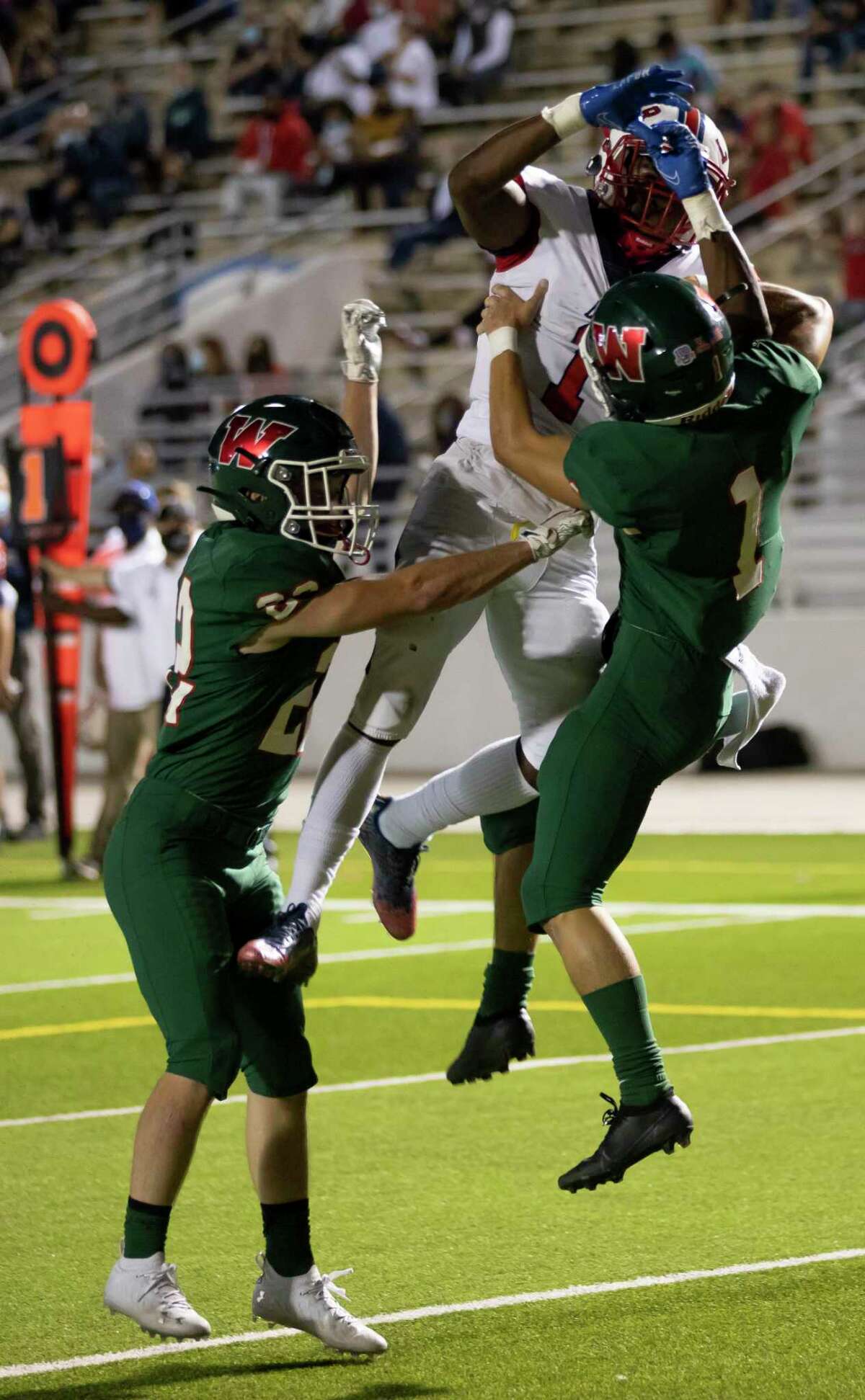 FOOTBALL: The Woodlands rolls past Lamar at home