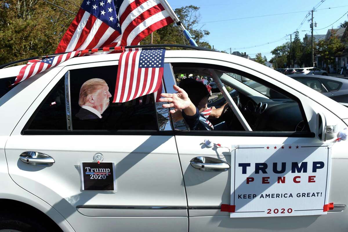 Enthusiastic crowd floods Guilford for Trump Car Parade