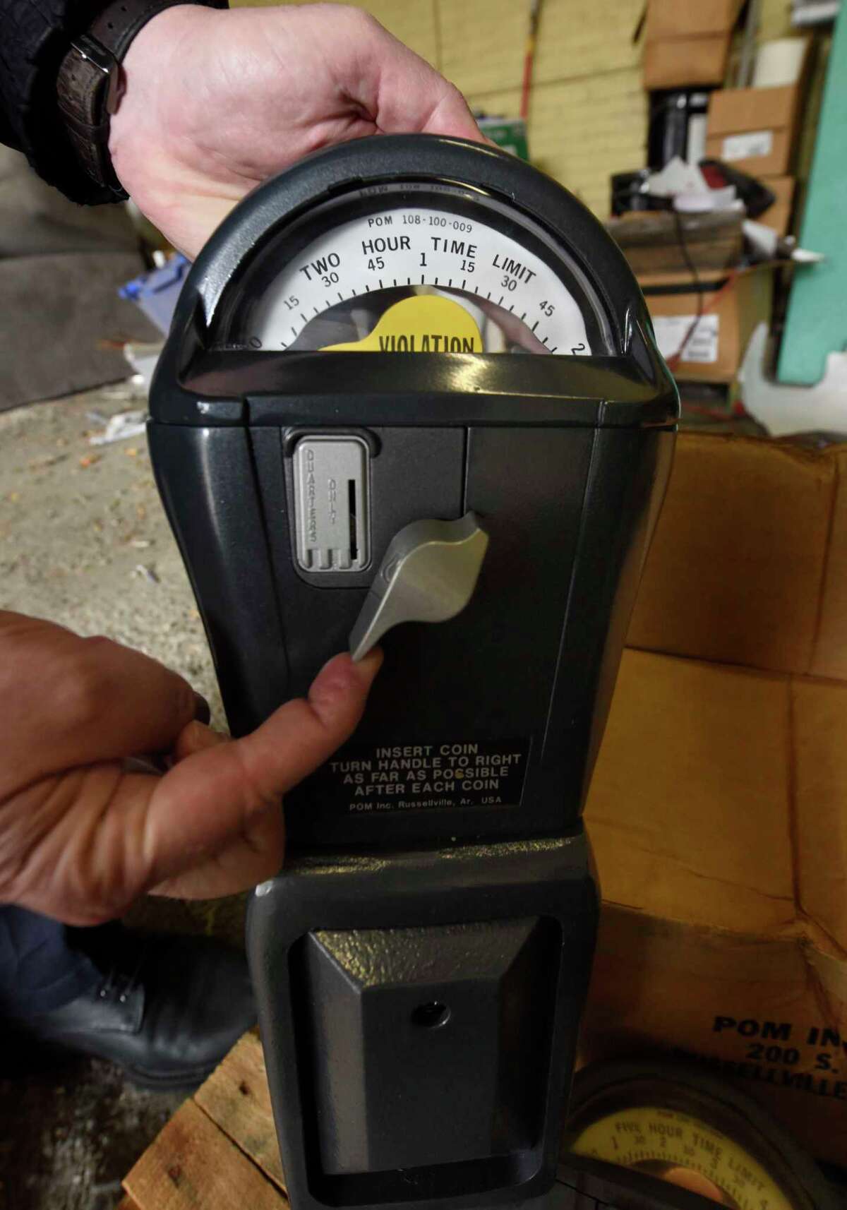 Troy's coin-fed parking meters deliver a final payout