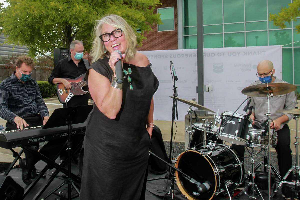 Dress for Success gets creative with drive-thru concert and food ...