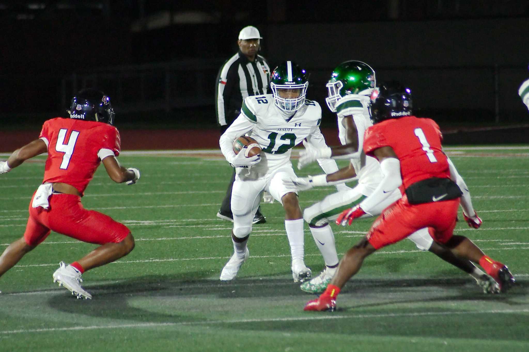 Football: Dawson races past Strake Jesuit, 50-7
