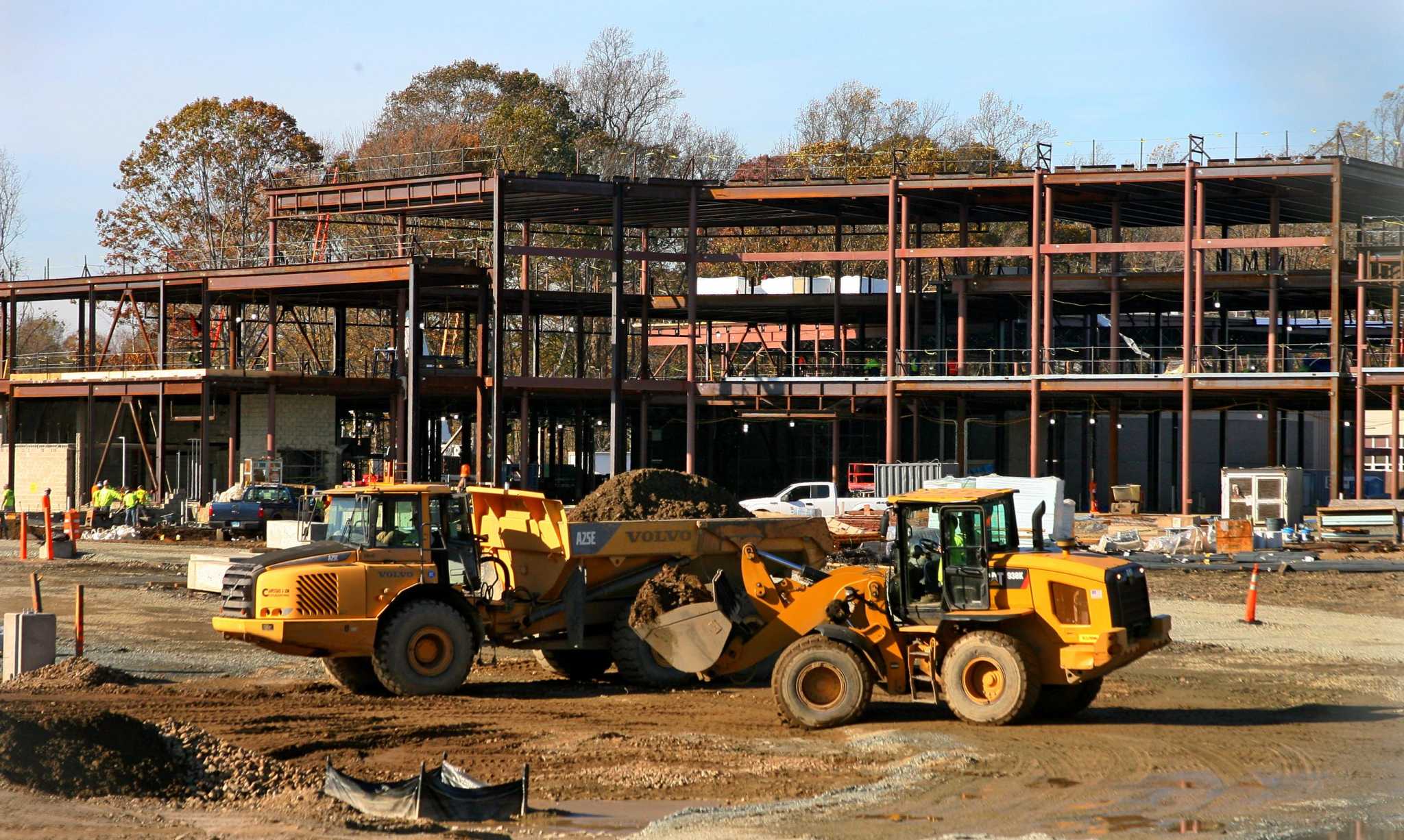 Down with the old, up with the new as workers build a new Platt Tech HS ...