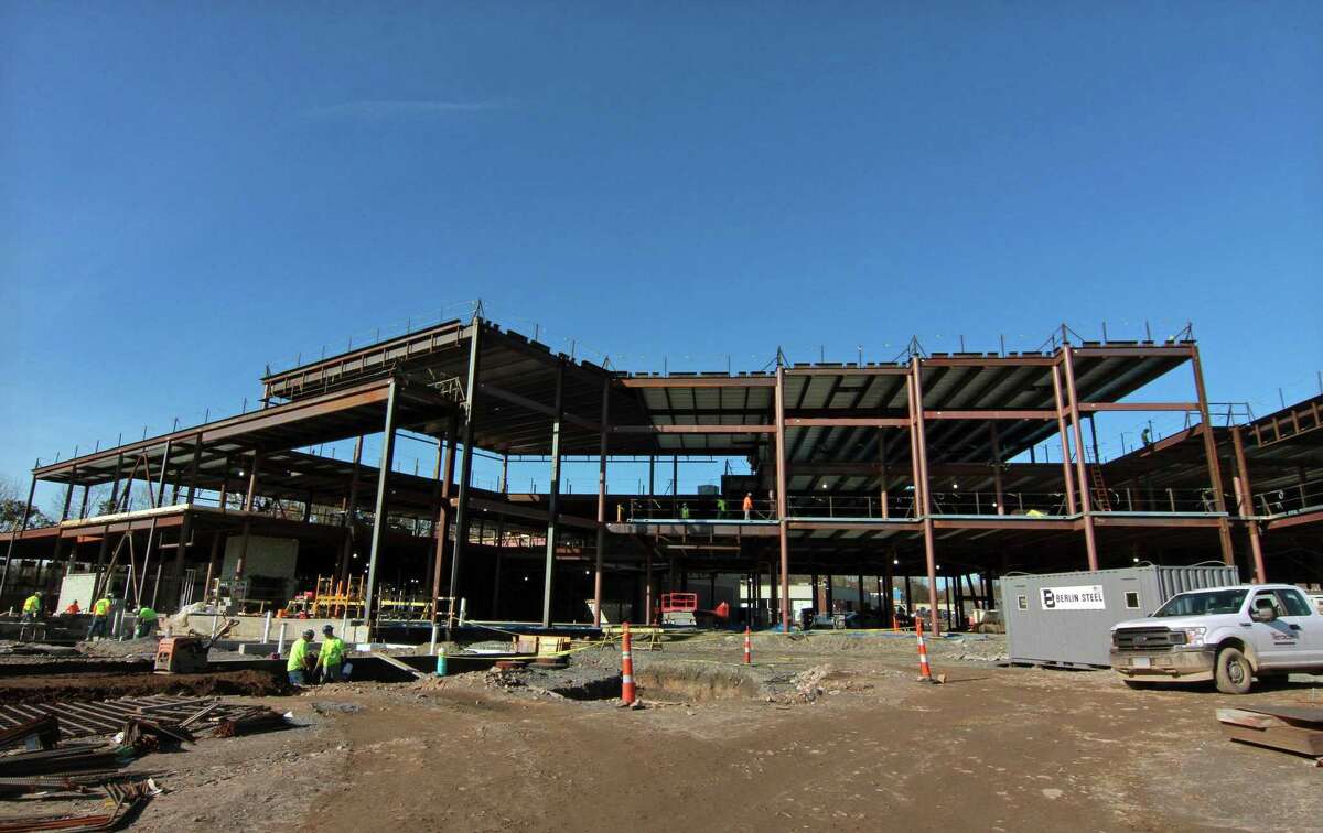 Down with the old, up with the new as workers build a new Platt Tech HS ...