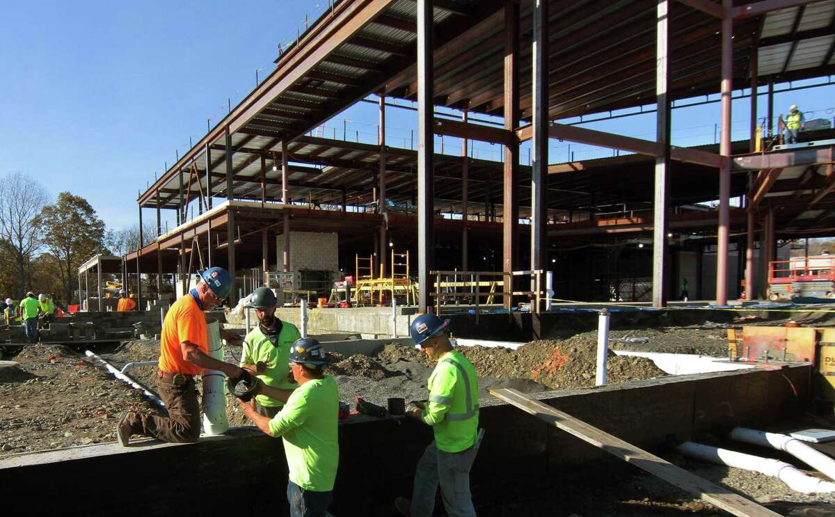 Down with the old, up with the new as workers build a new Platt Tech HS ...
