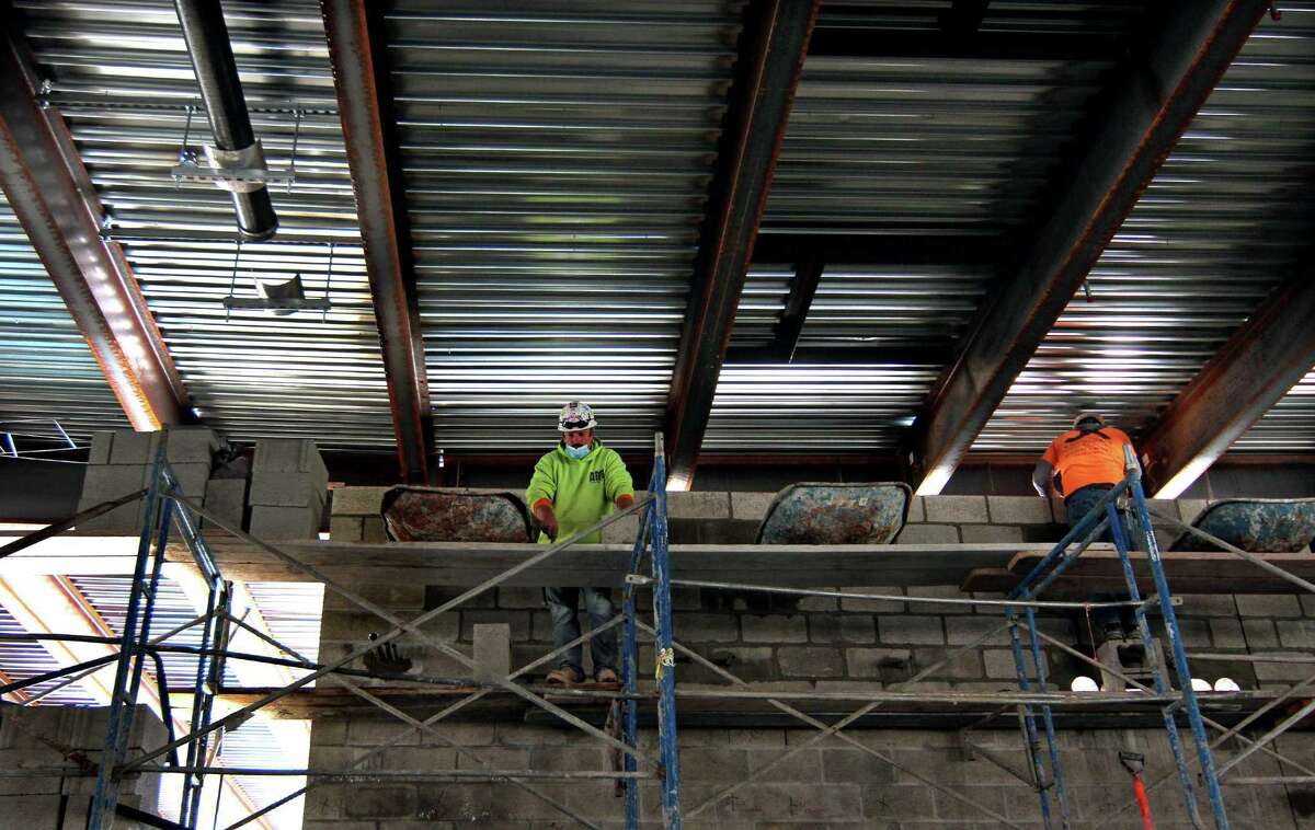 Down with the old, up with the new as workers build a new Platt Tech HS ...