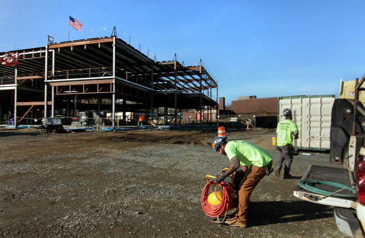 Down with the old, up with the new as workers build a new Platt Tech HS ...