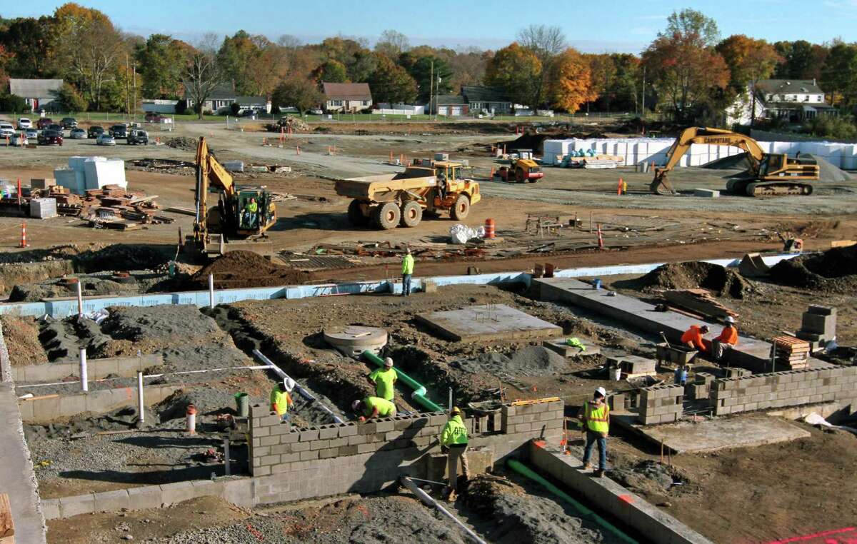 Down with the old, up with the new as workers build a new Platt Tech HS ...