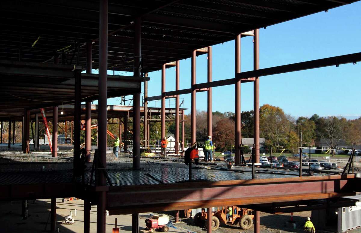 Down with the old, up with the new as workers build a new Platt Tech HS ...