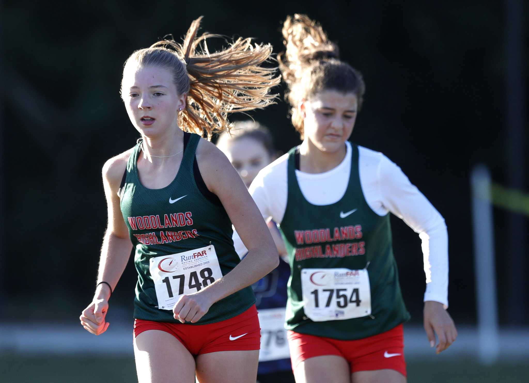 CROSS COUNTRY: The Woodlands teams win regional titles
