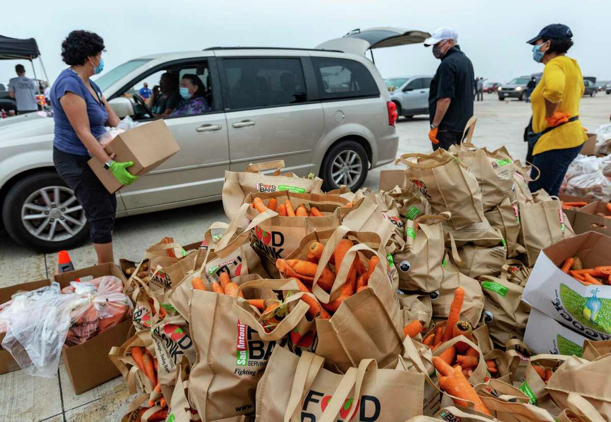 ‘It helps tremendously’: Hundreds of cars line up for free food from ...