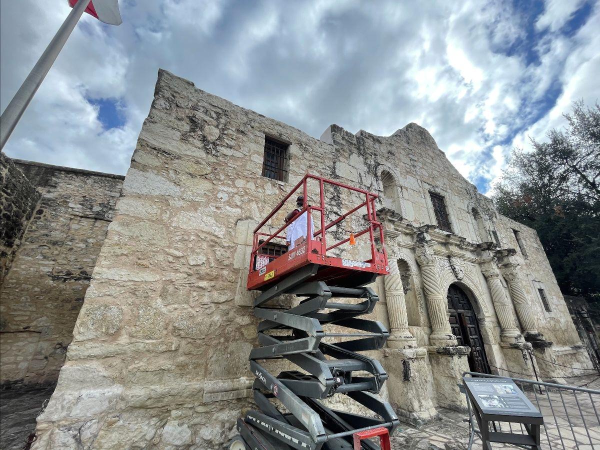 Researcher examining walls of San Antonio’s Alamo church to determine ...