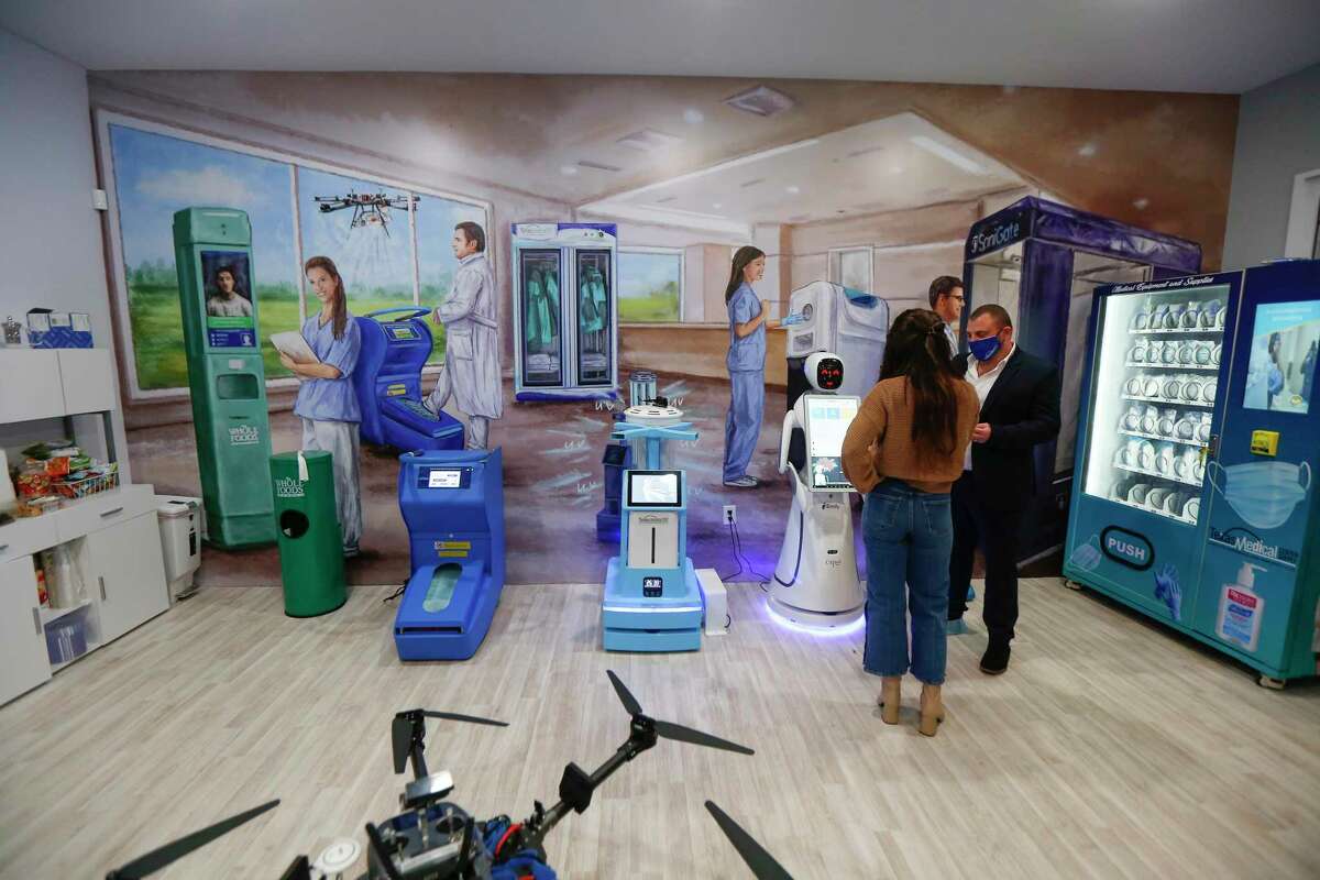 Inside the Houston PPE supplier making masks, hand sanitizer dispensers ...