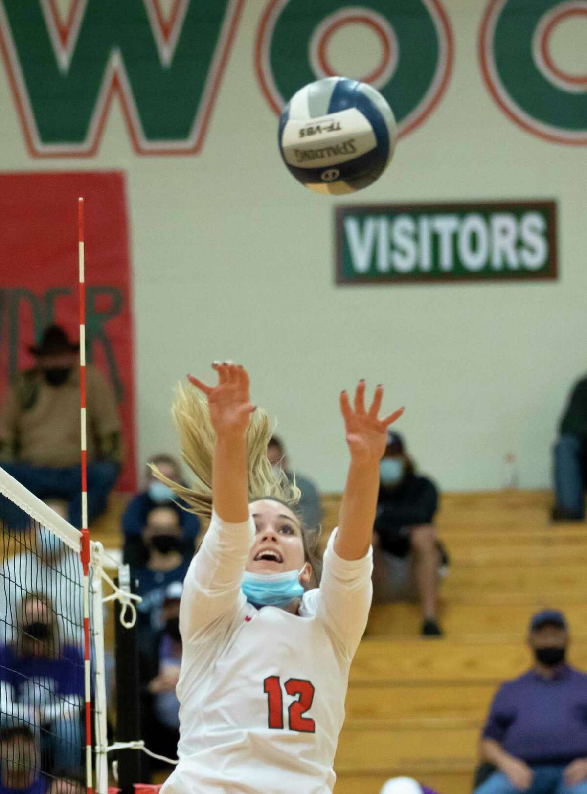 VOLLEYBALL: The Woodlands holds off Klein Cain in five sets to advance