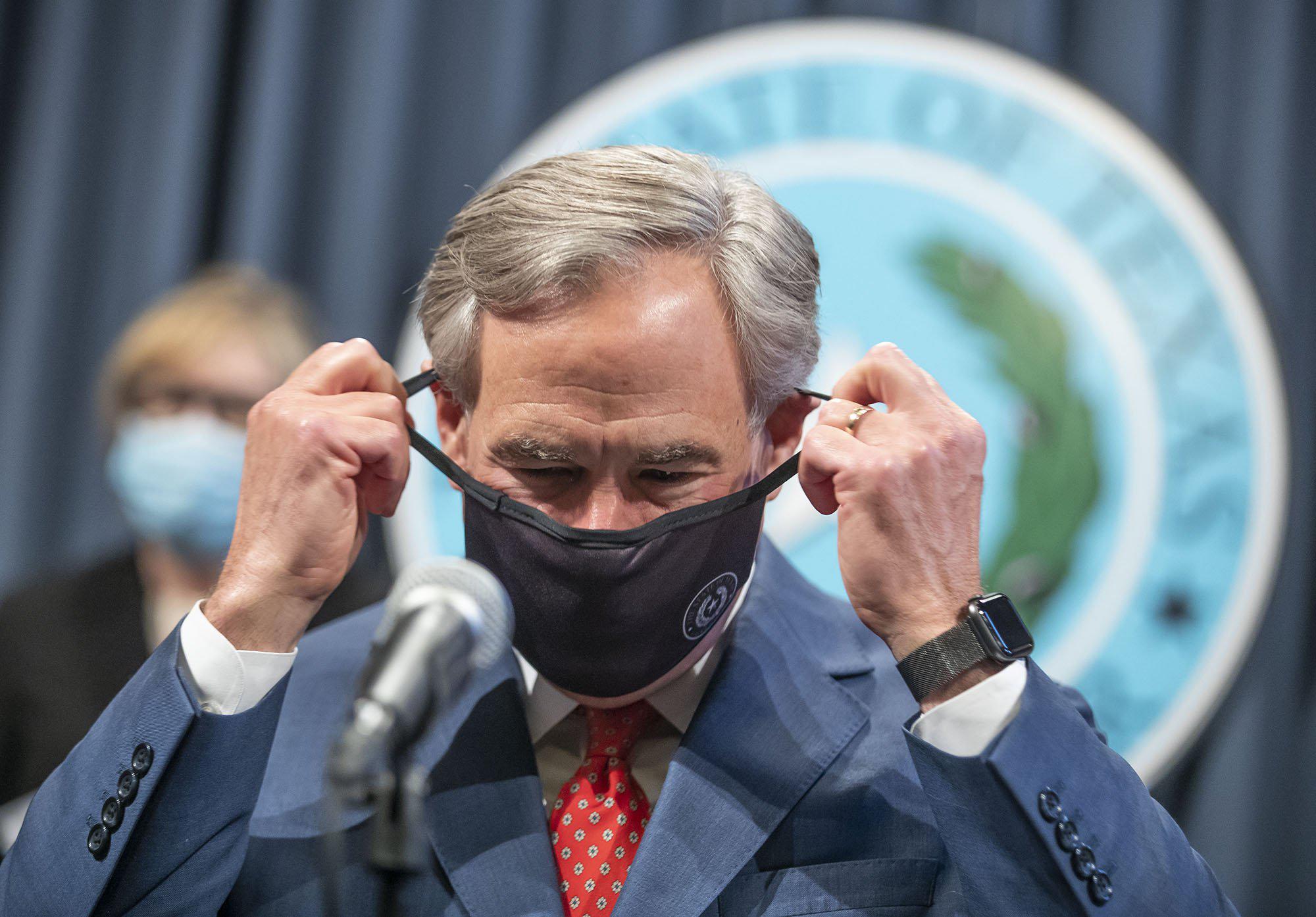 Gov. Greg Abbott recommends masks days after deeming actual mask ...