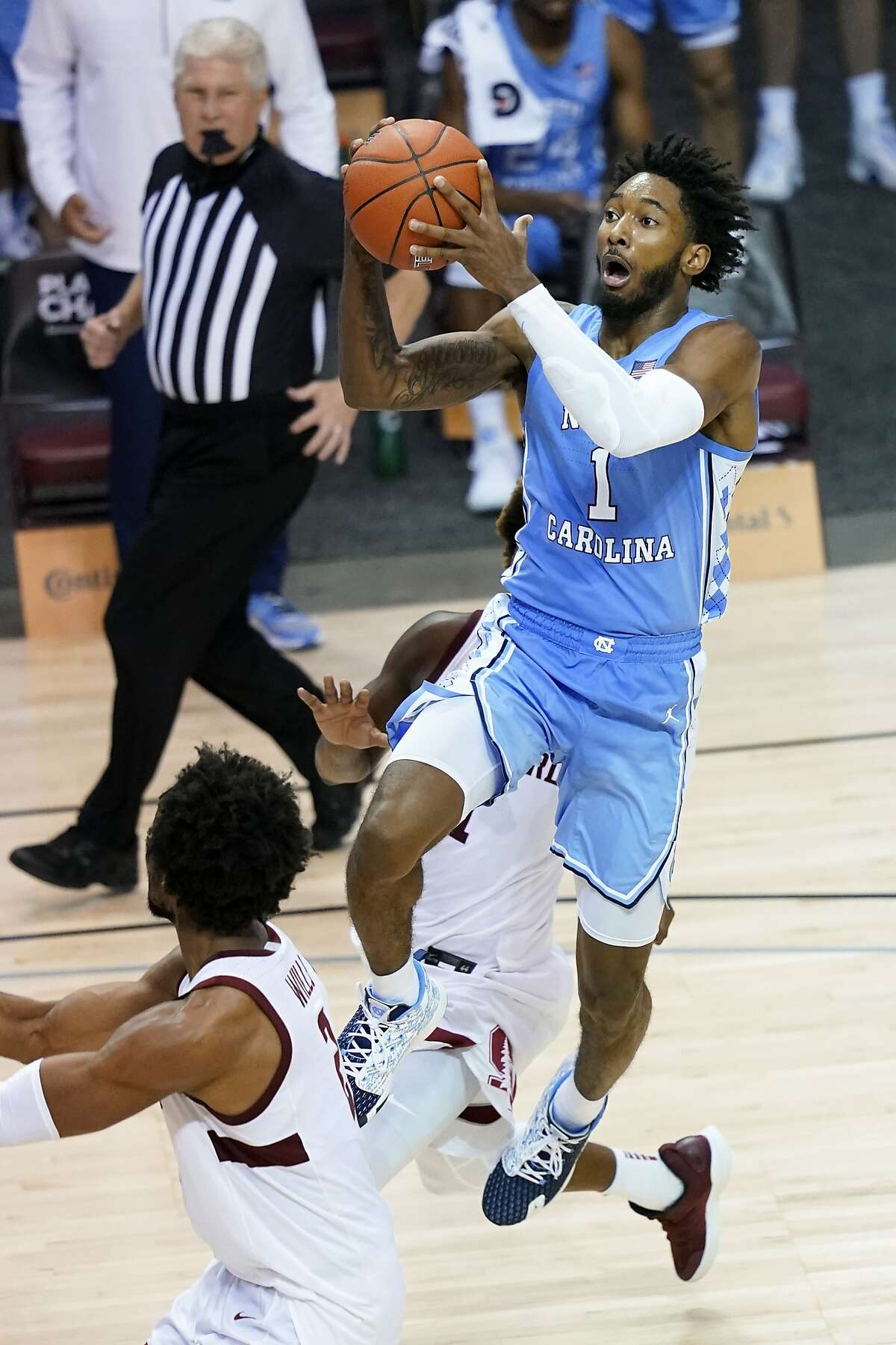 Leaky Black helps North Carolina slip past Stanford