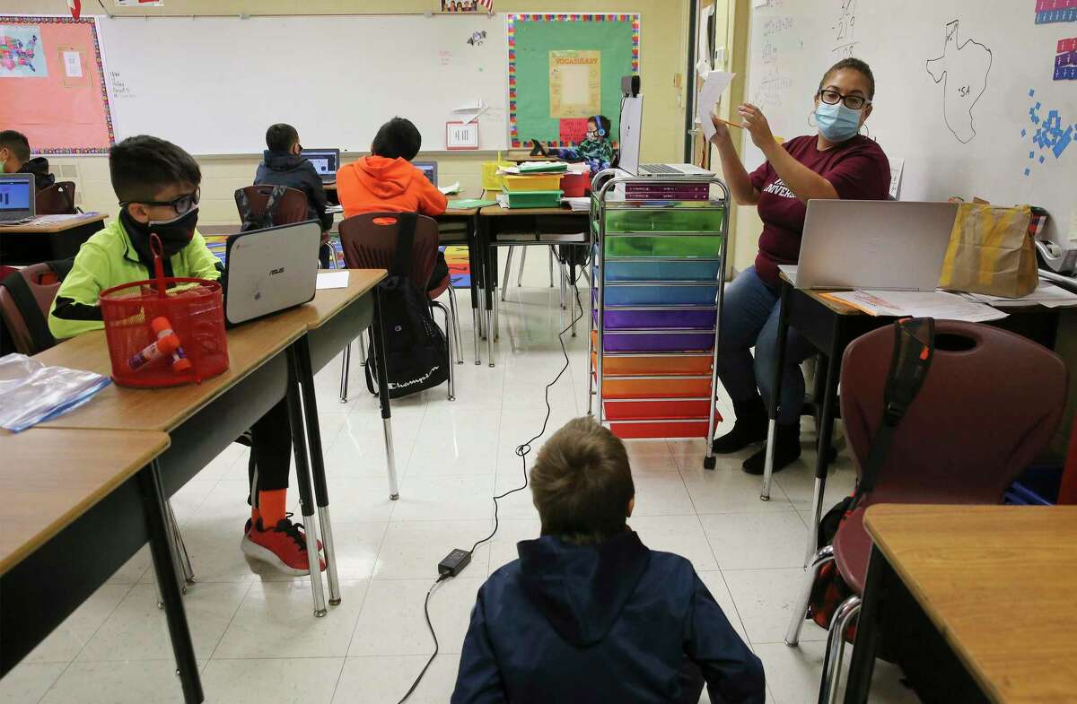 Amid COVID surge, San Antonio students pour back into some campuses ...