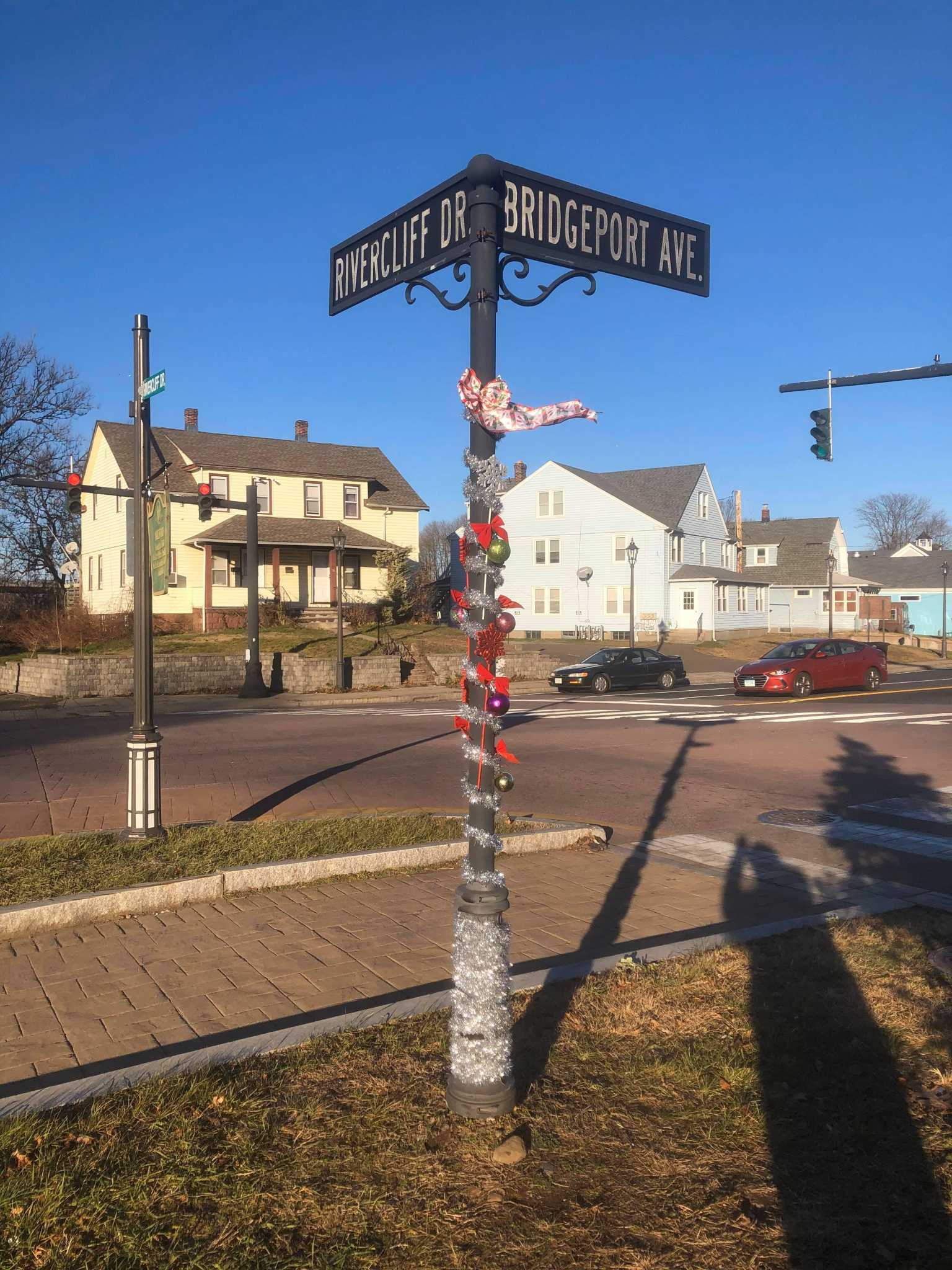 ‘A little cheer into a year that had so little’: Decorated street signs ...