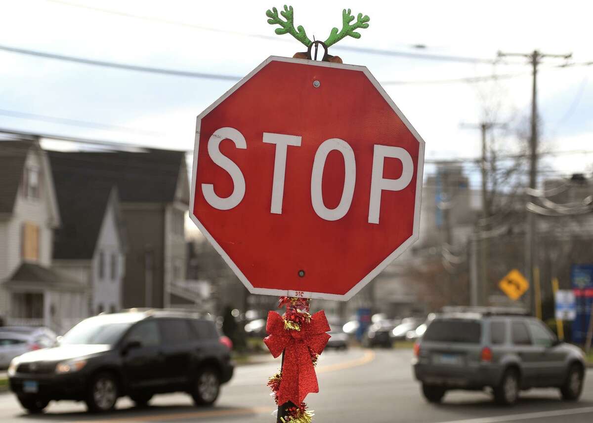 ‘A little cheer into a year that had so little’: Decorated street signs ...