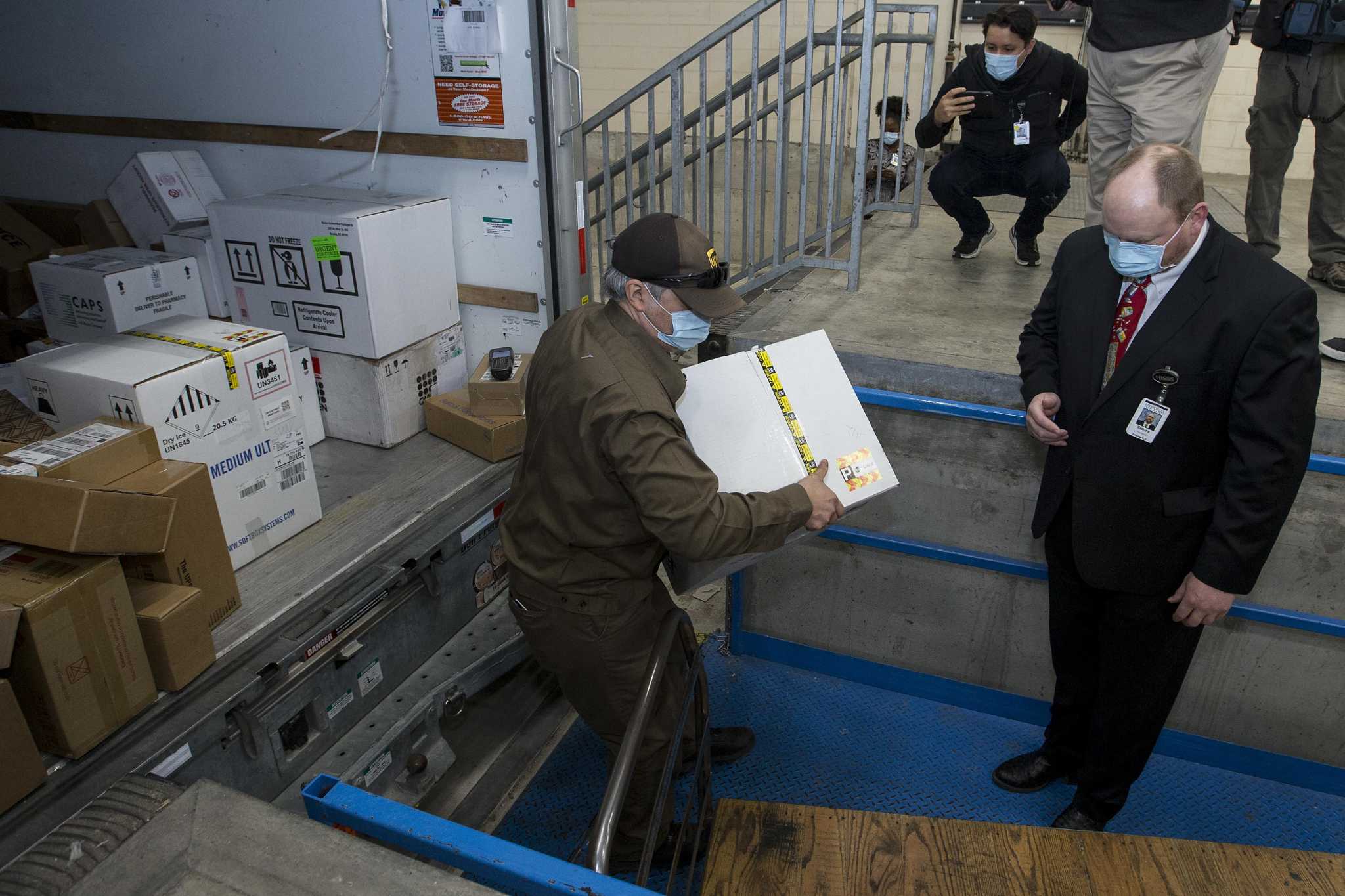 Delivery services working overtime to ship vaccines and presents