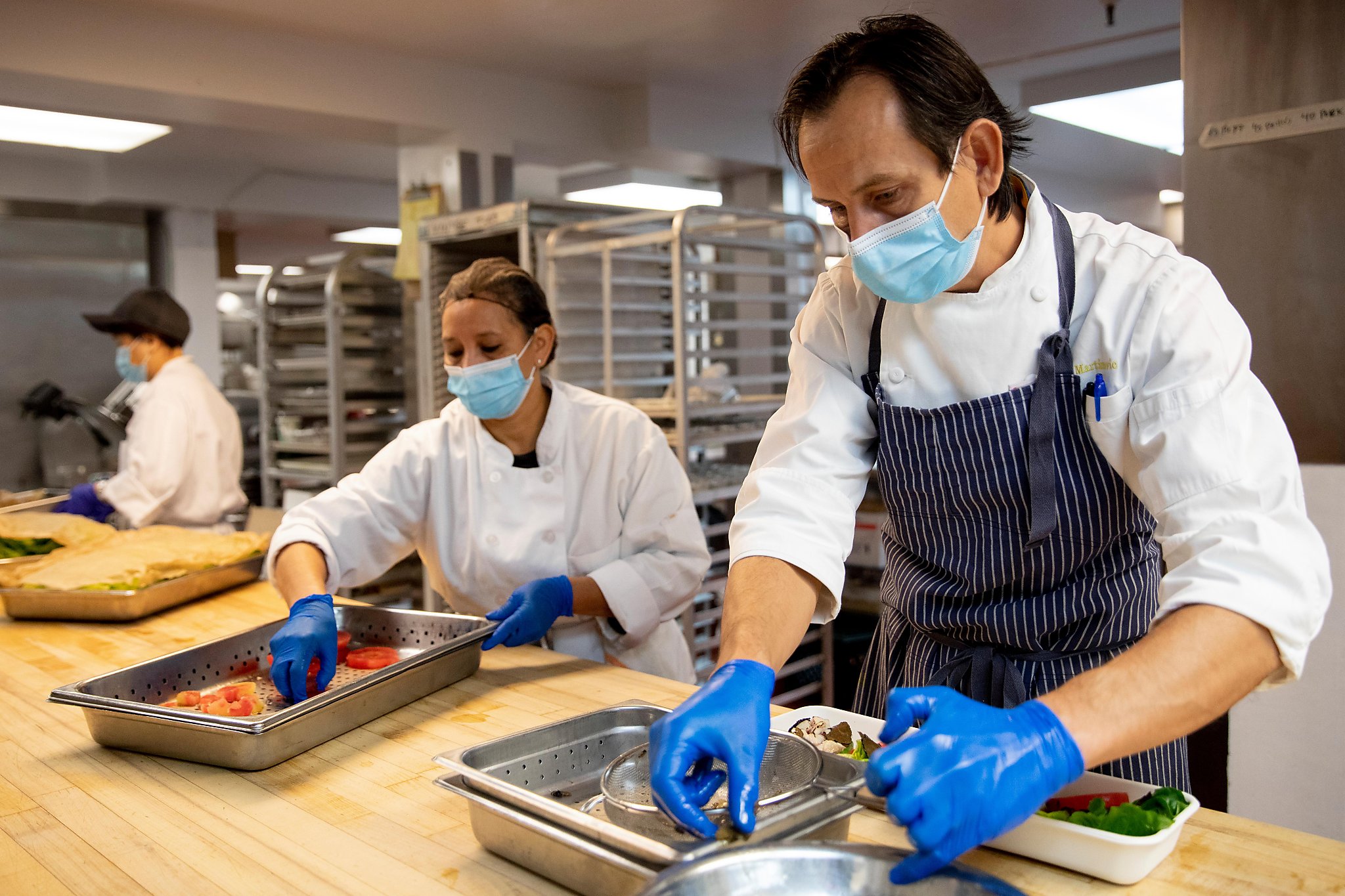 Canceled holiday parties hurt event workers, from caterers to carolers