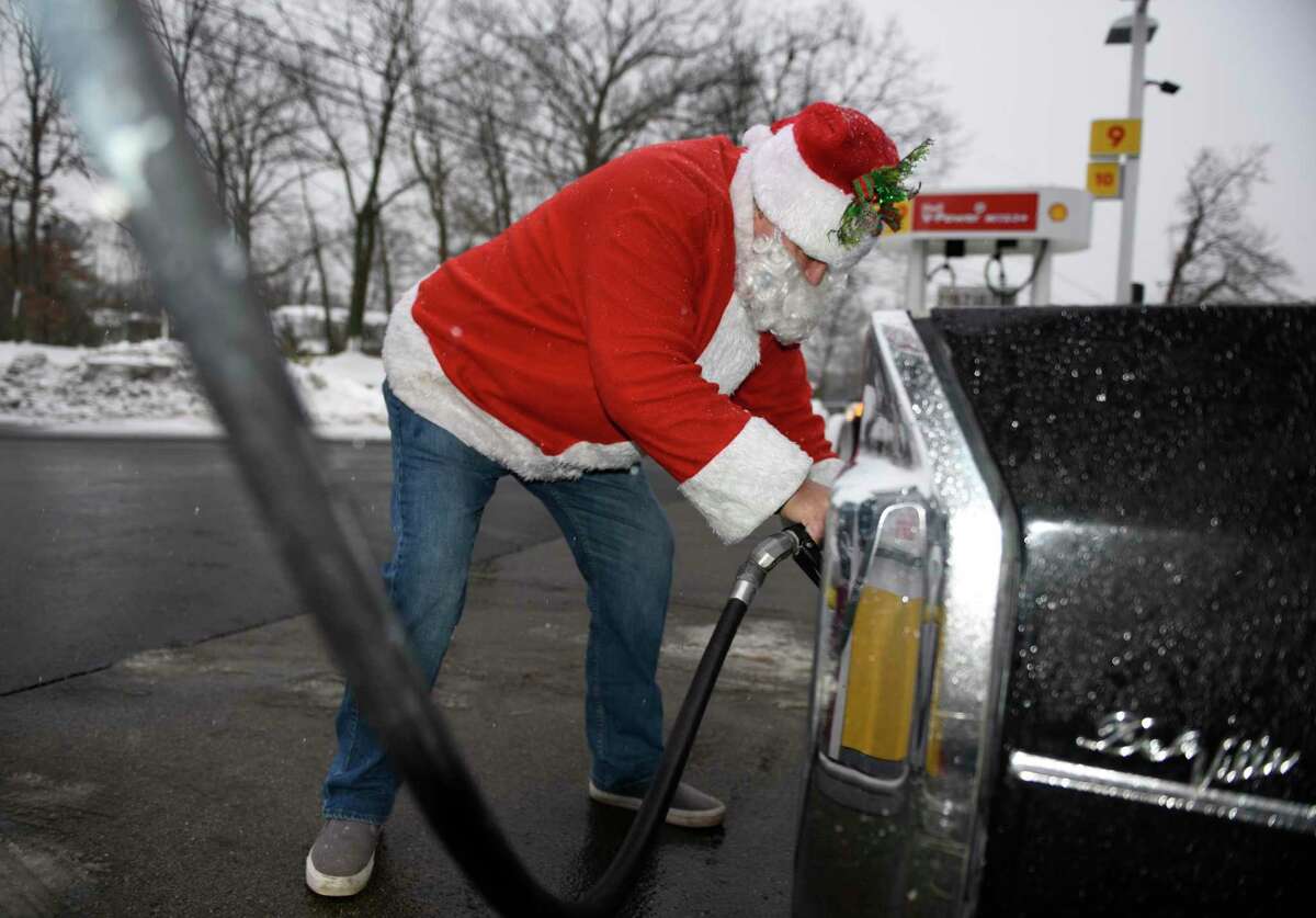 Santa cruises in a convertible in Greenwich