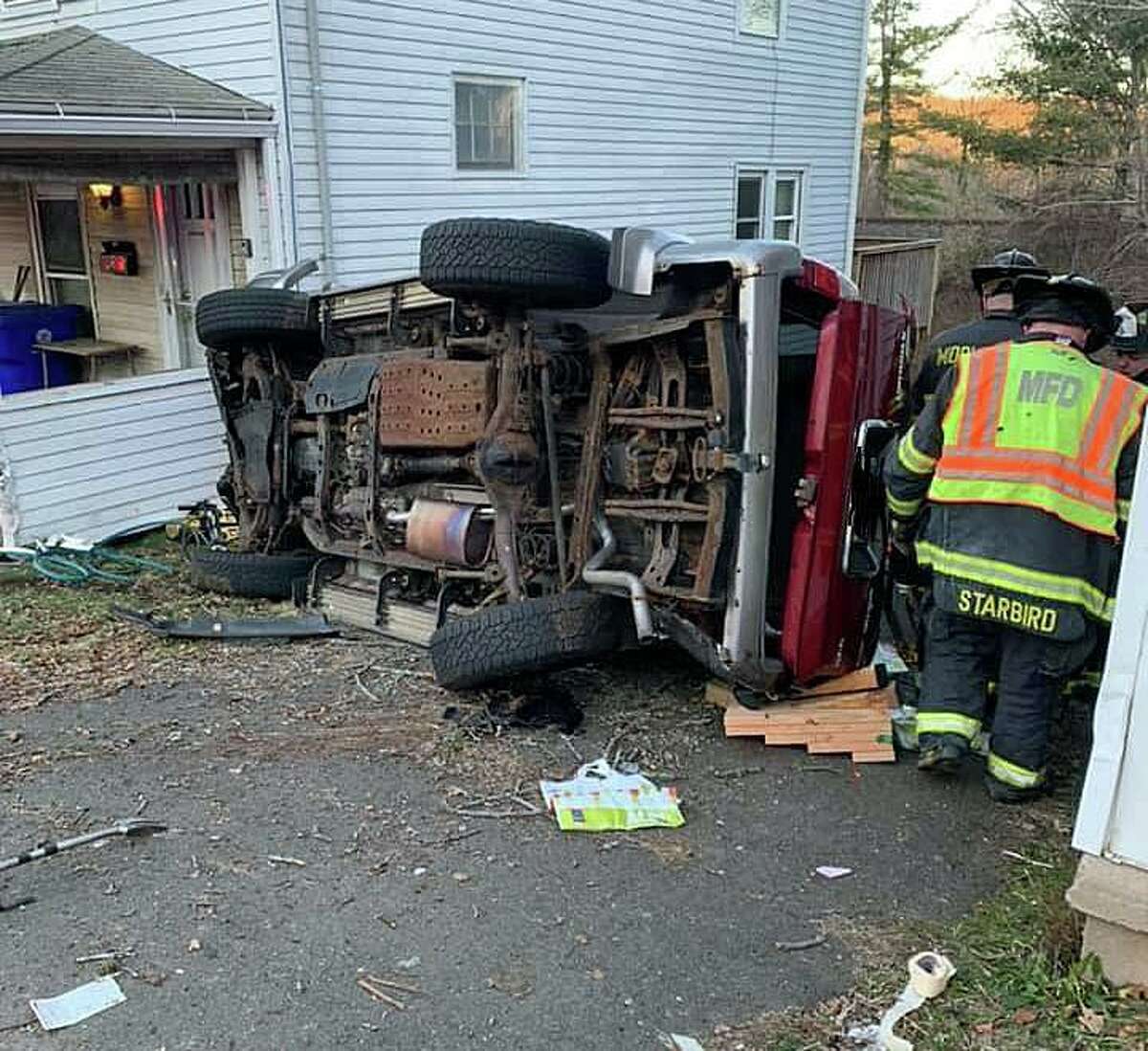 Officials: 1 person trapped after crash, rollover on Route 66