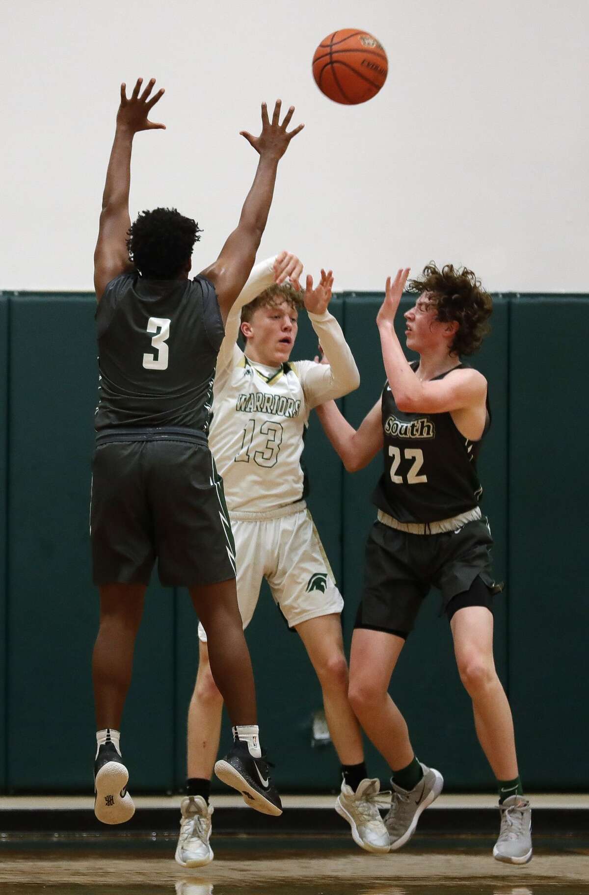 BOYS HOOPS: TWCA holds on against Lutheran South