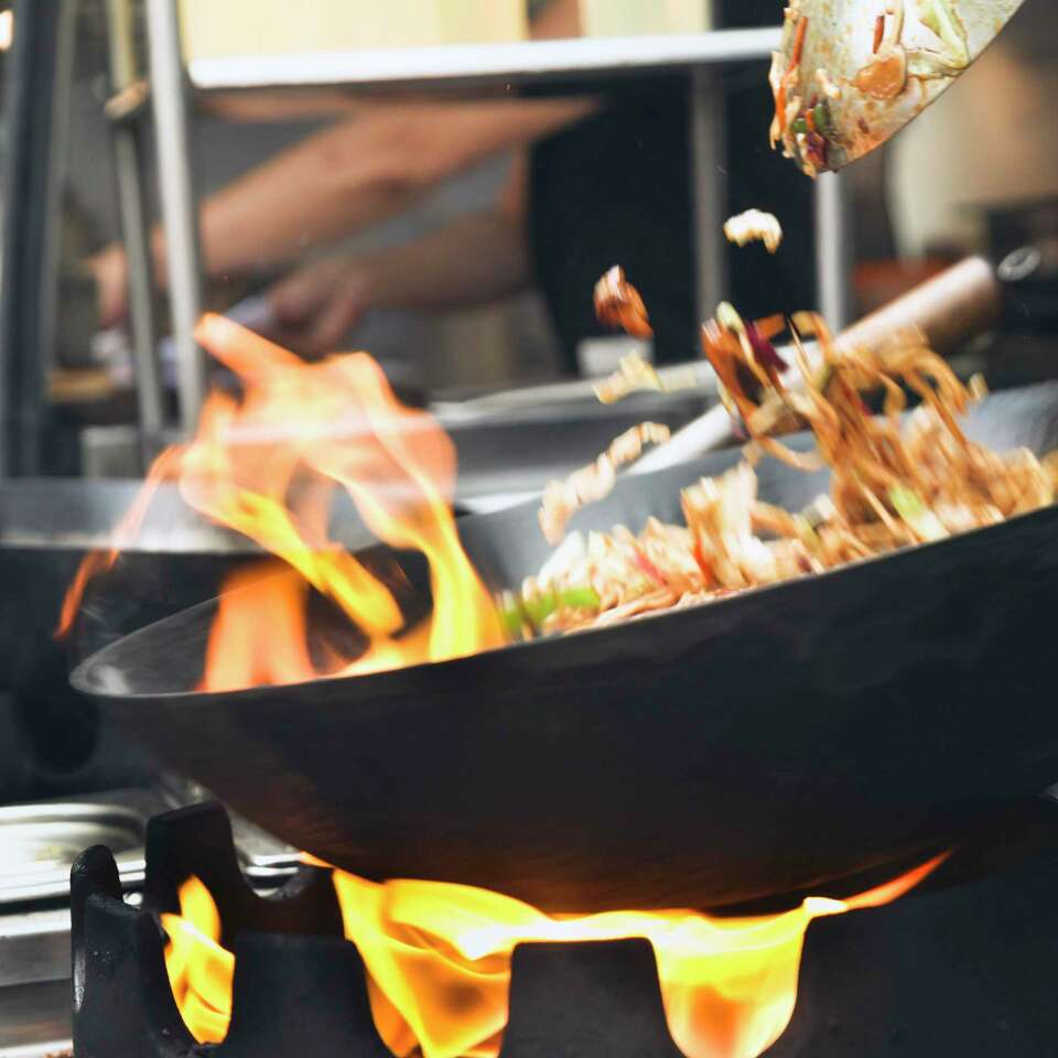 Your wok can do so much more than stir-fry: popcorn, deep frying, braises