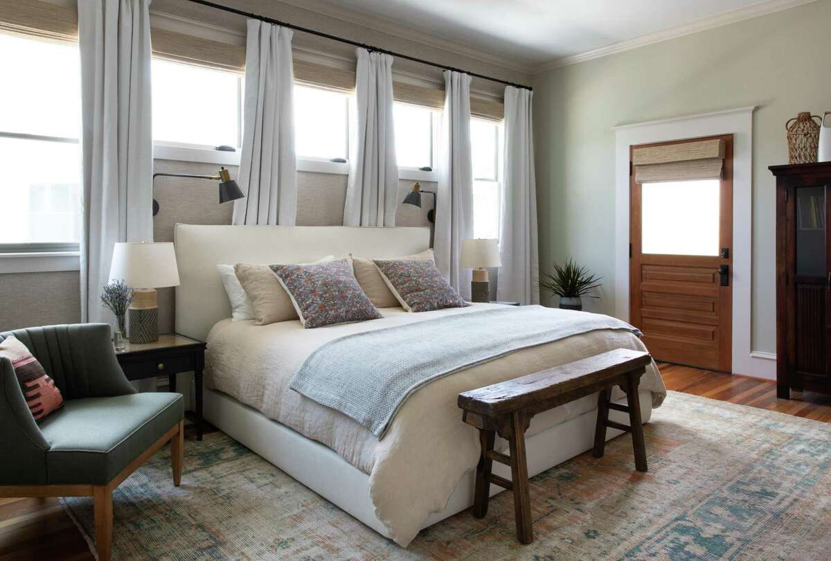 This couple built a modest home in the Heights with big porches