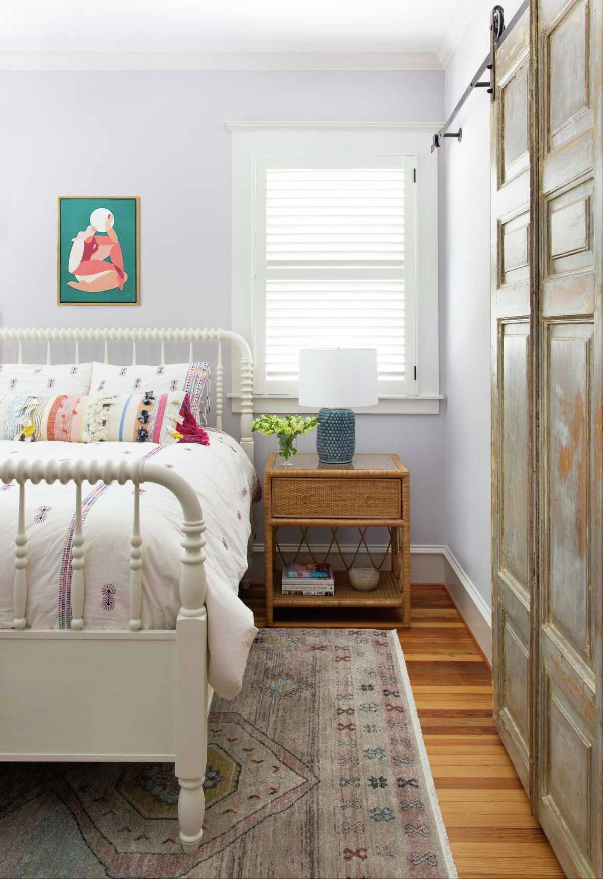 This couple built a modest home in the Heights with big porches