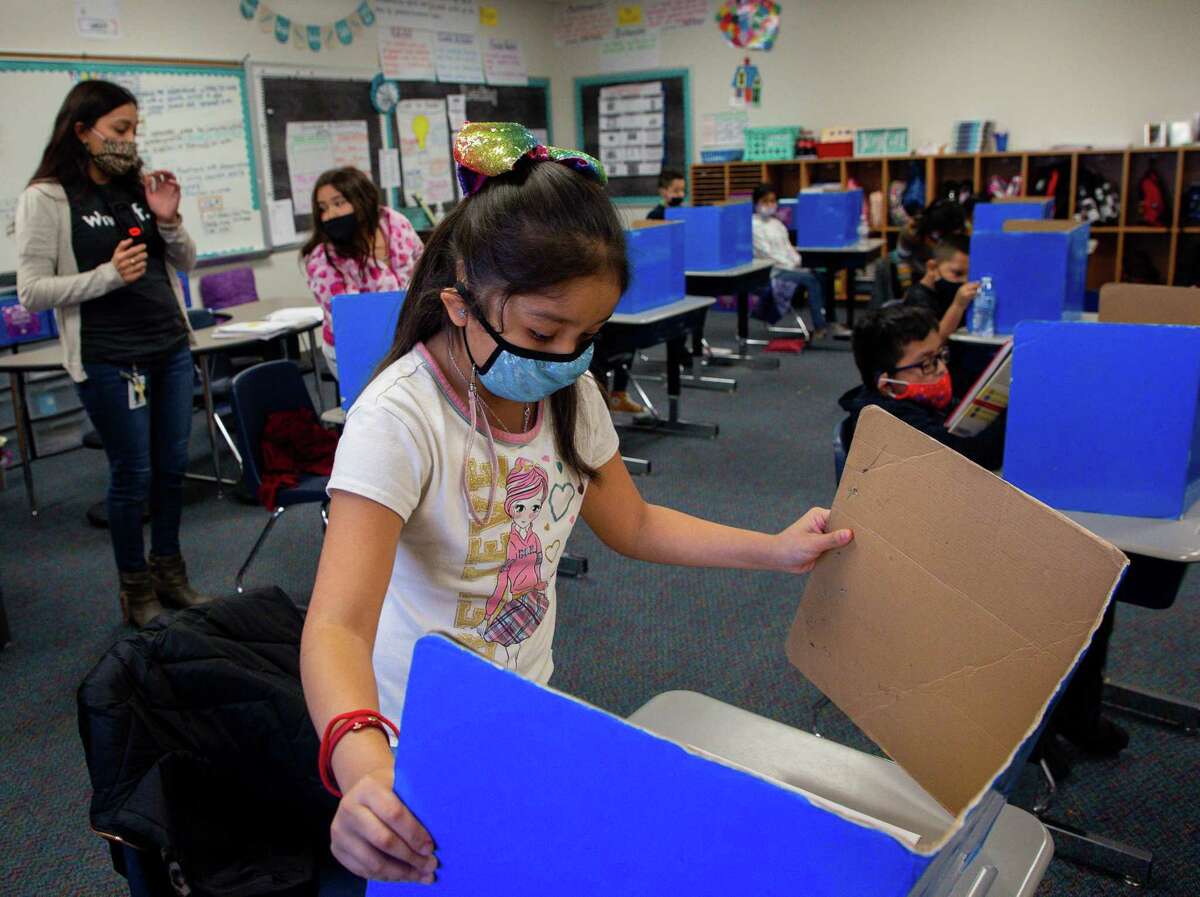 Despite COVID-19 surge, thousands of students return to Houston ...