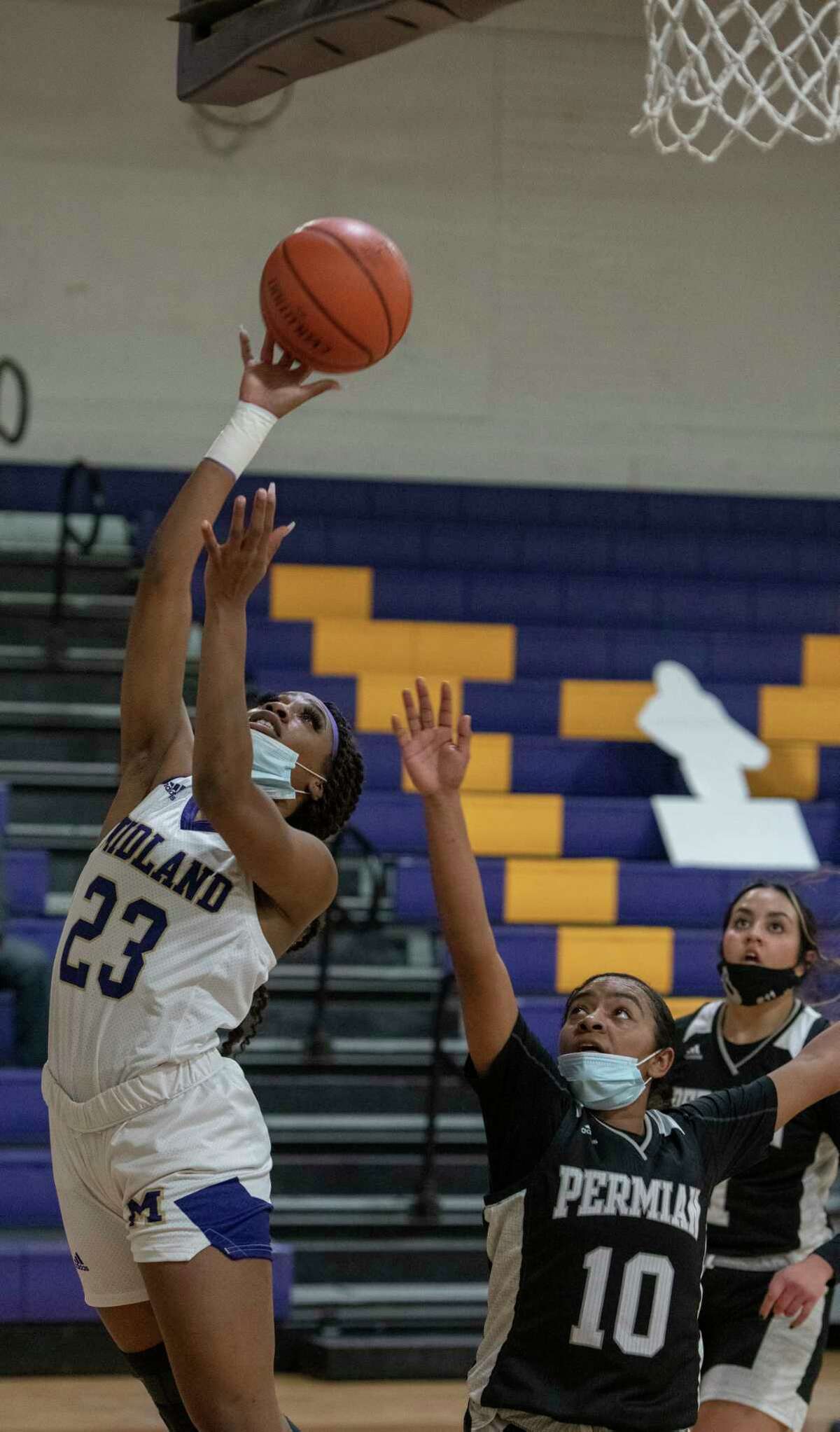 HS GIRLS BASKETBALL: MHS holds off alum-led Permian team, 52-39