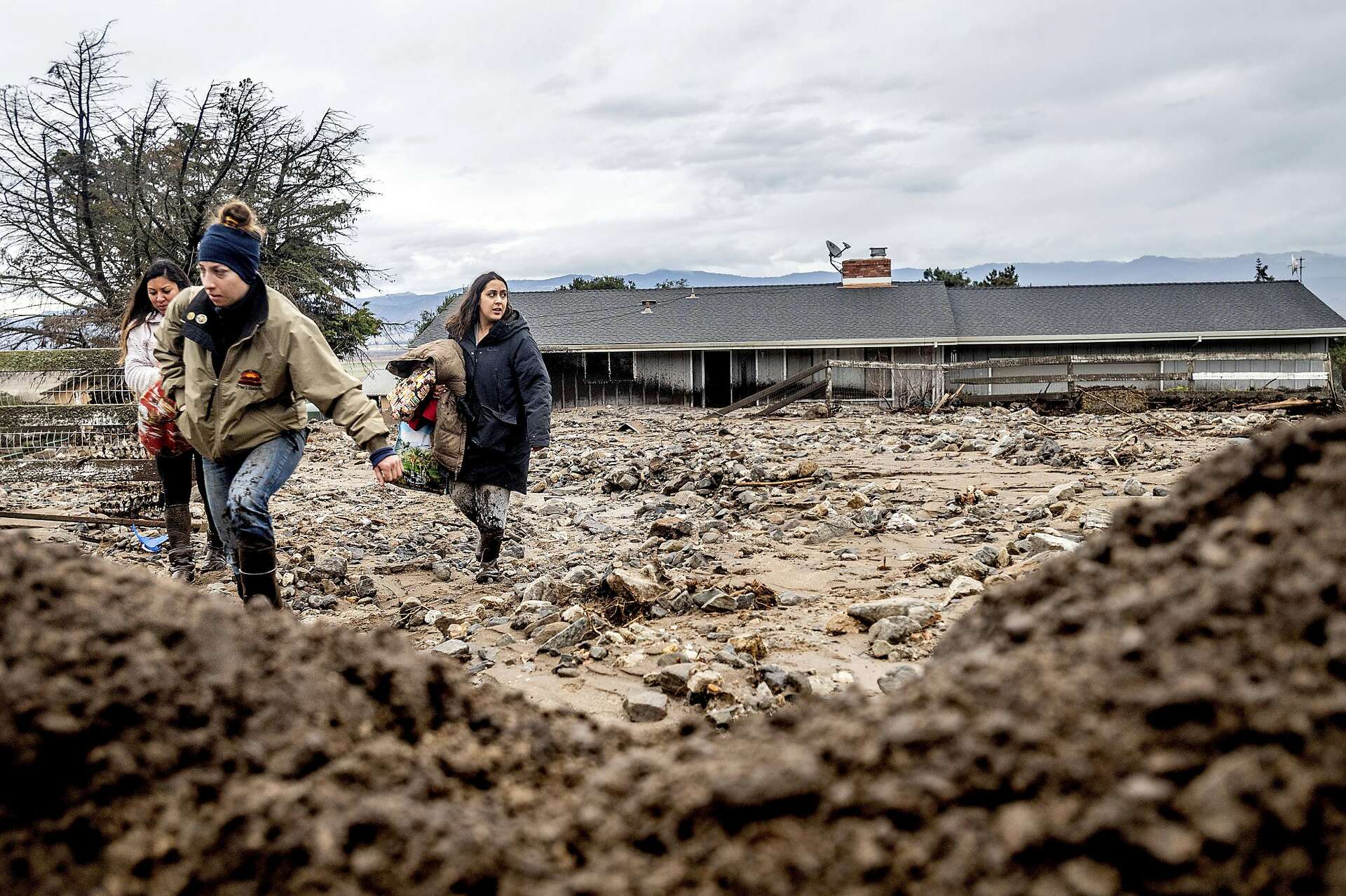 Mud flow in River Fire burn scar slams Salinas neighborhood