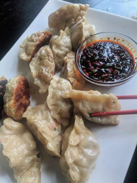 Gretchen's table: Pork pot stickers with soy-garlic dipping sauce