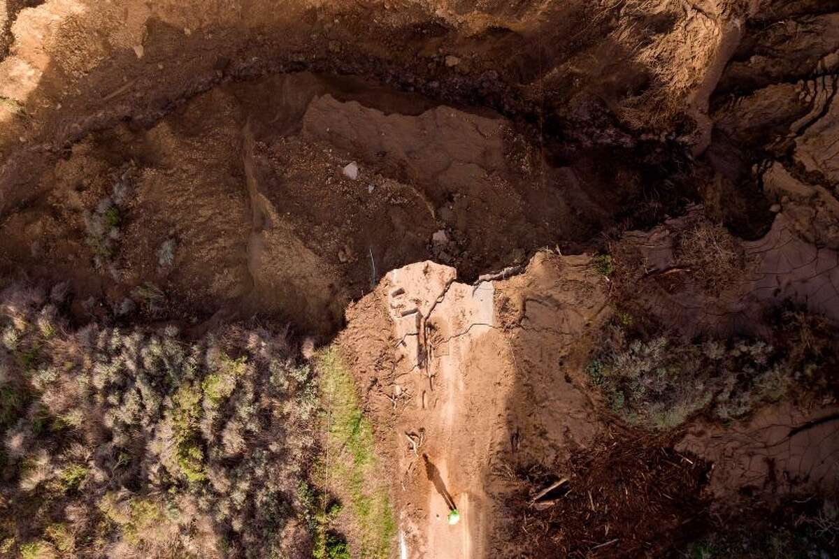 More photos show Highway 1 damage; reopening date unknown