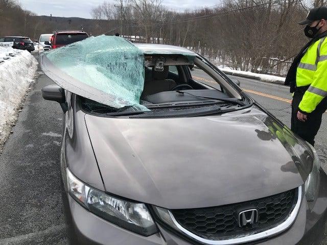 Wolcott PD: Chunk of ice flies off truck, crashes through windshield ...