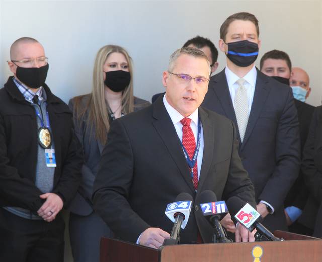 Adopted son charged in ‘heinous attack’