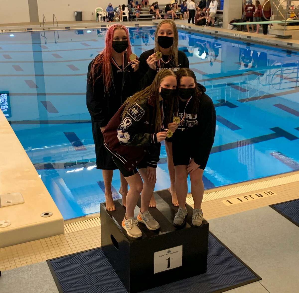 Katy Taylor girls win third straight regional swimming title