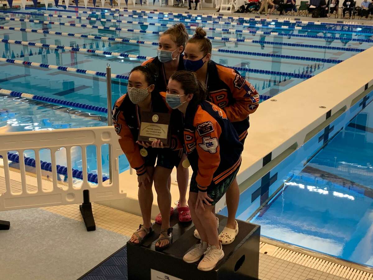 Katy Taylor girls win third straight regional swimming title