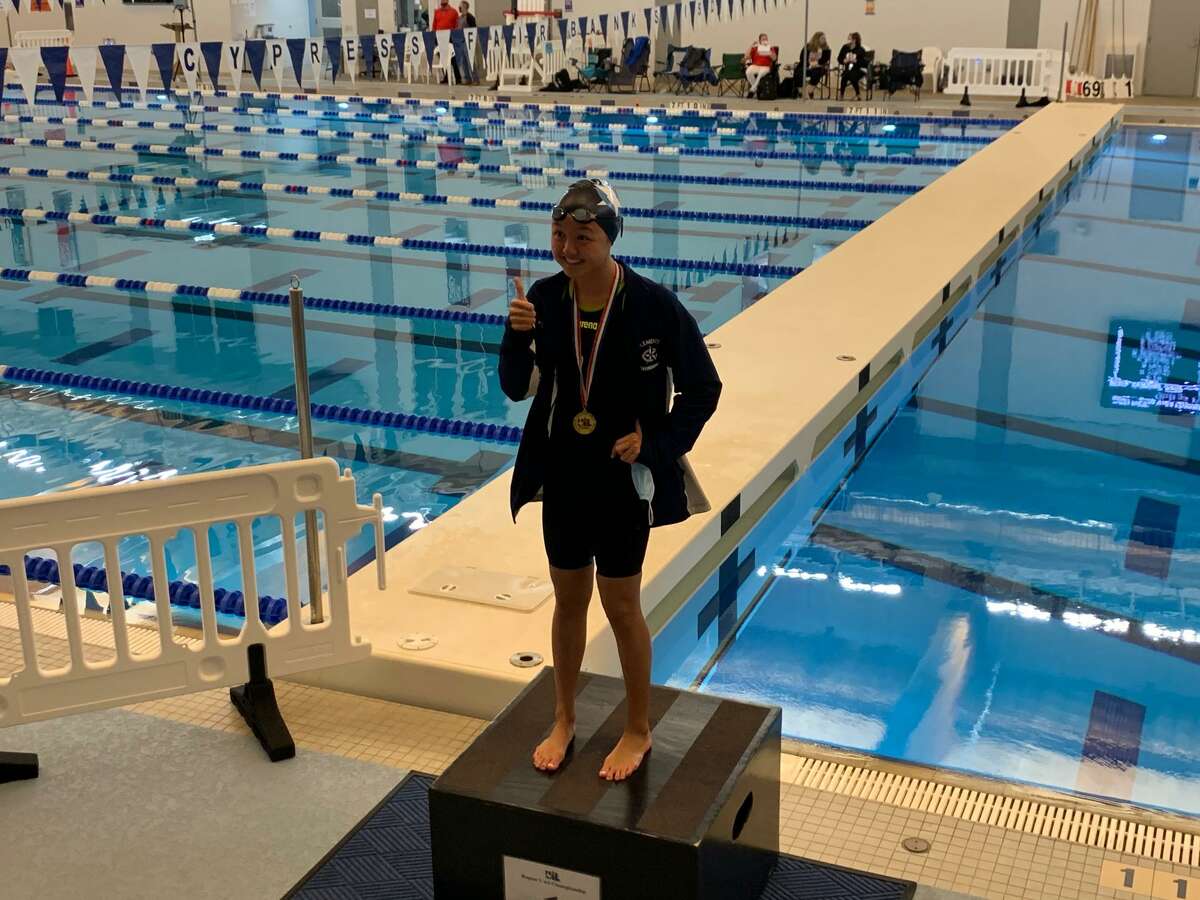 Katy Taylor girls win third straight regional swimming title