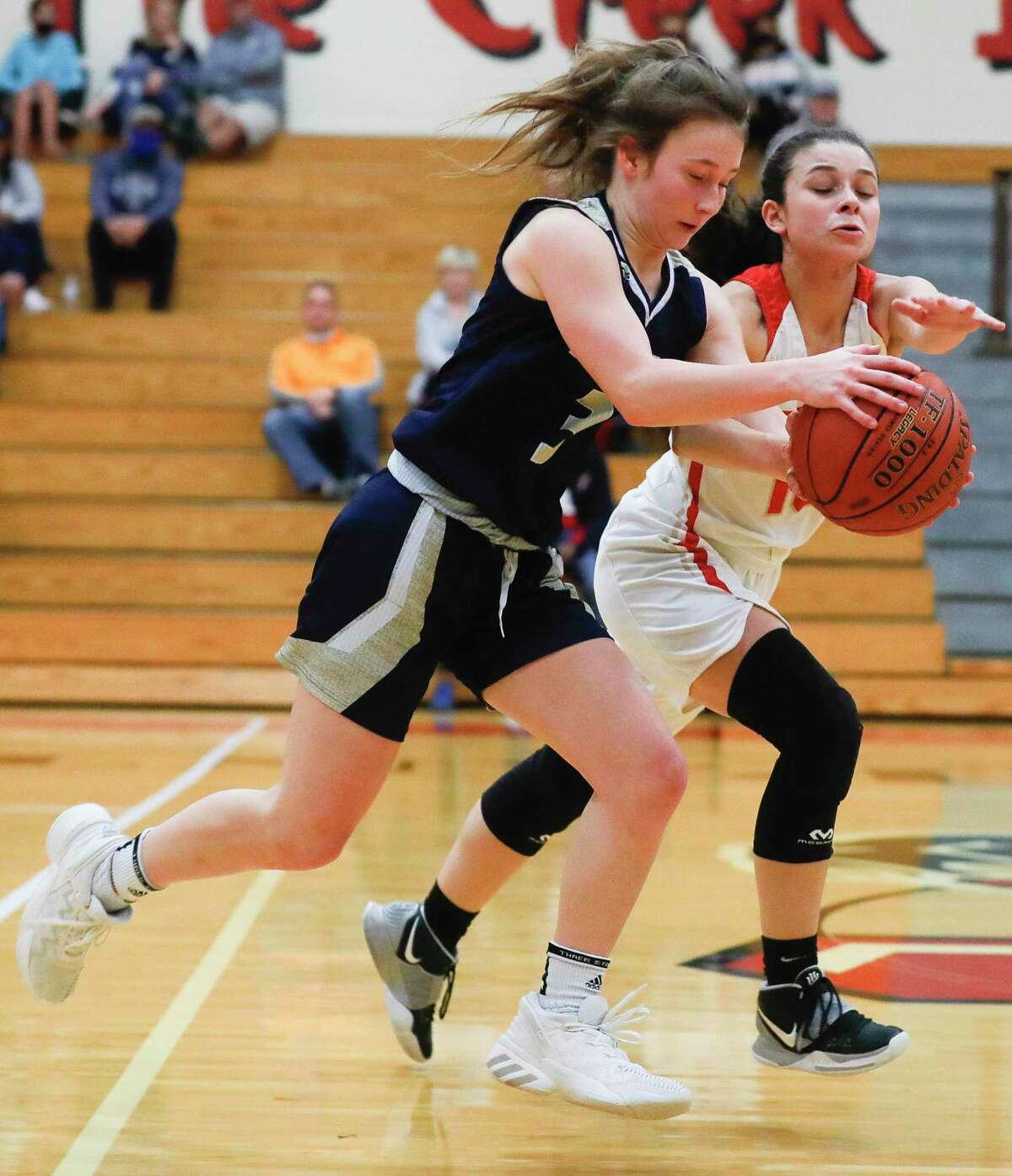 GIRLS HOOPS: Lake Creek tops Caney Creek, both teams turn focus to playoffs