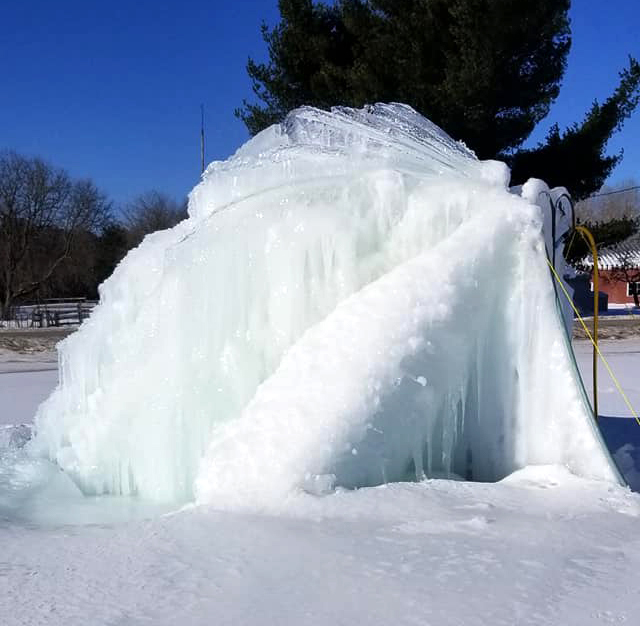 Evart ice sculptor creates 10-foot tall iceberg in yard
