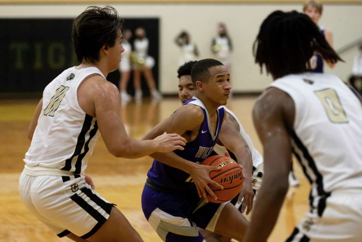BOYS HOOPS: Conroe holds off Willis, remains in tight playoff race