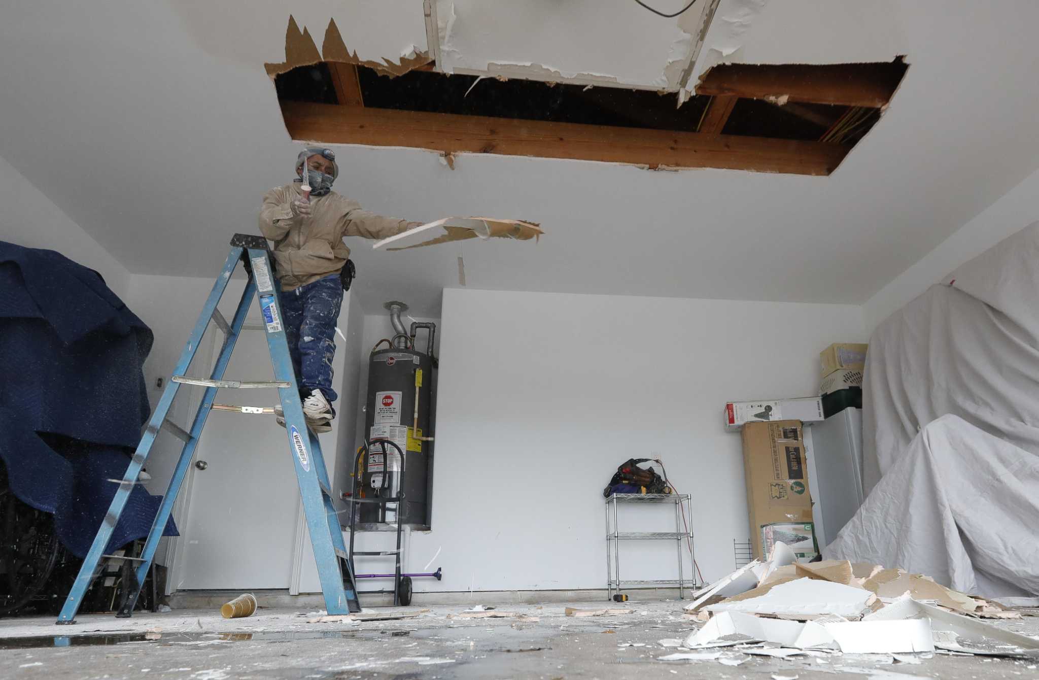 Busted garage pipe totals grieving Splendora teacher’s car