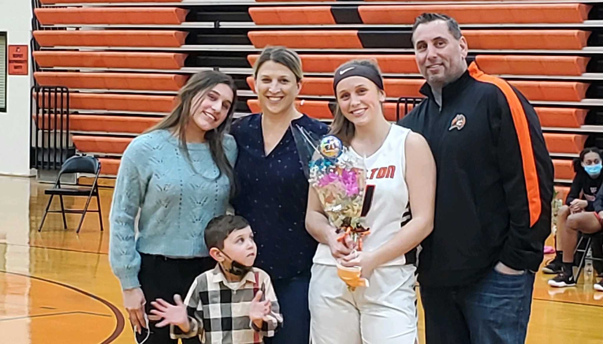 Injured Shelton basketball player Devan Wildman scores one more basket