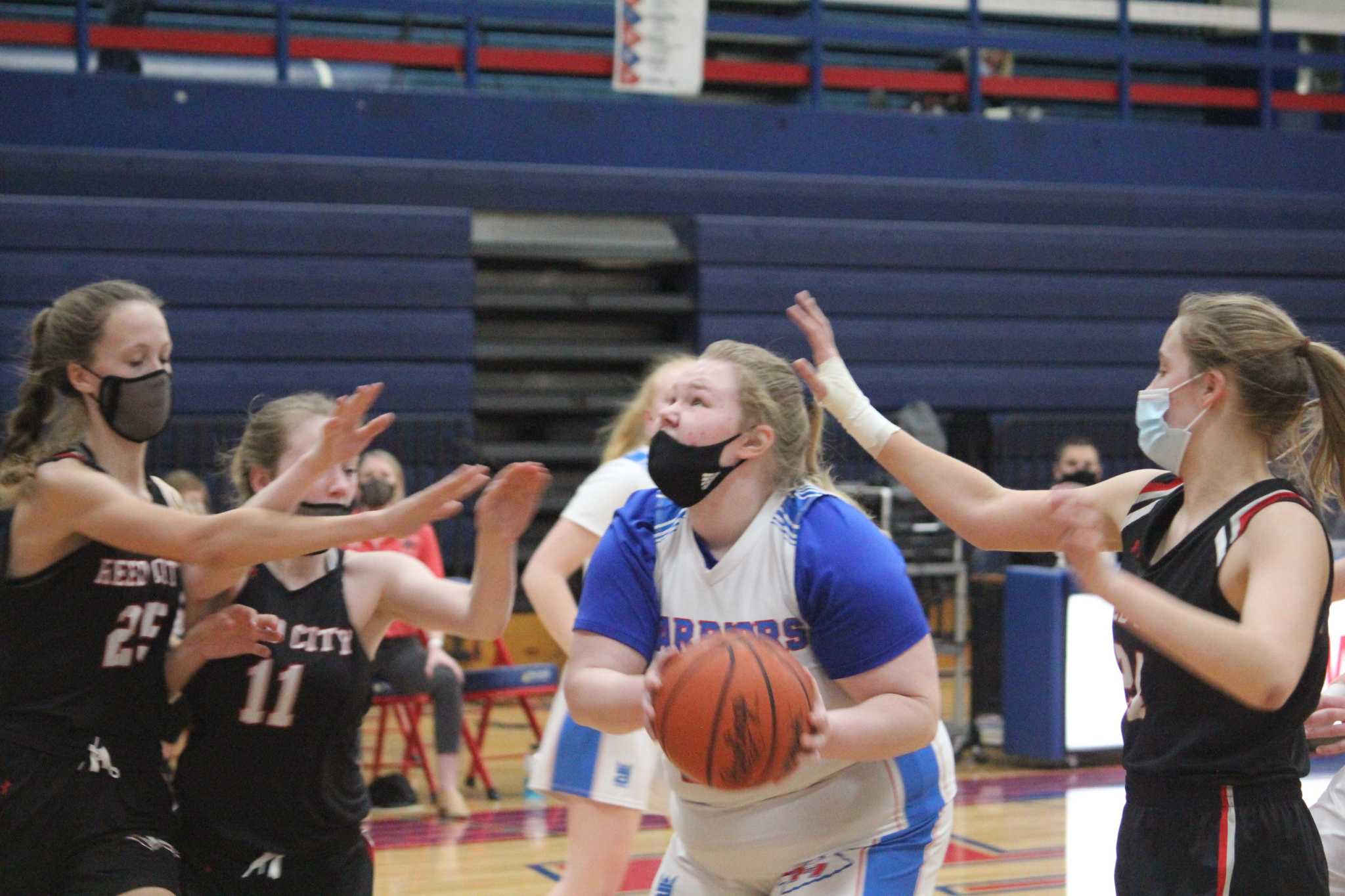 Warriors overcome Reed City for first girls hoops win