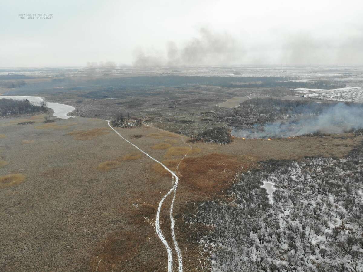 Caseville Fire Department works to maintain Rush Lake grass fire