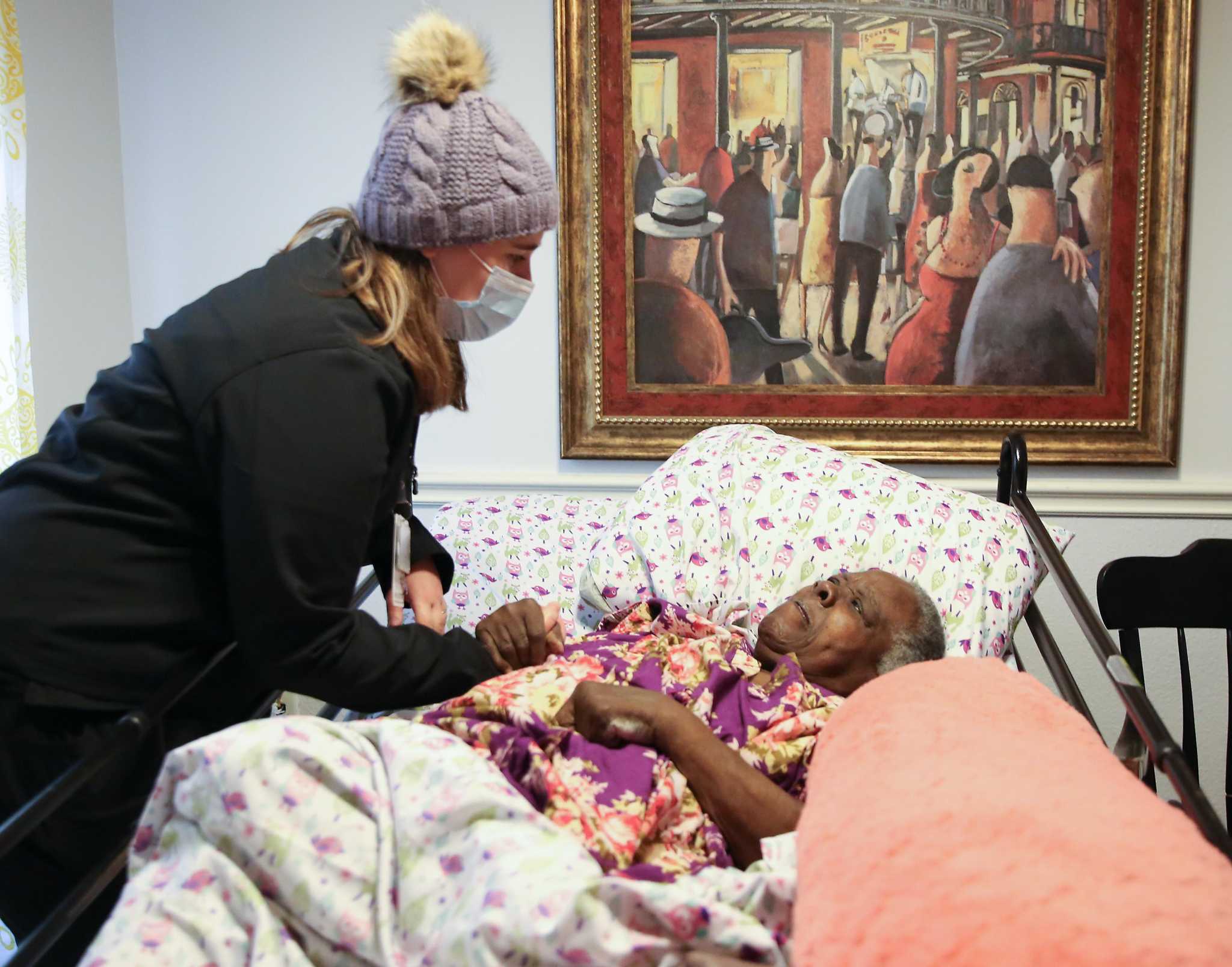 UTMB nurses deliver COVID vaccines to homebound patients in bitter cold ...